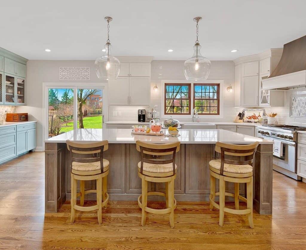 Stained Wood Flooring In Bright Kitchen - Soul & Lane