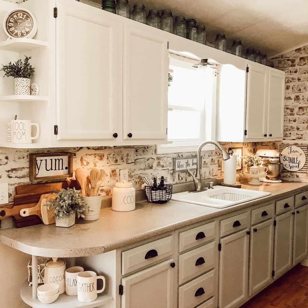 Rustic Red Brick Backsplash and White Cabinets - Soul & Lane