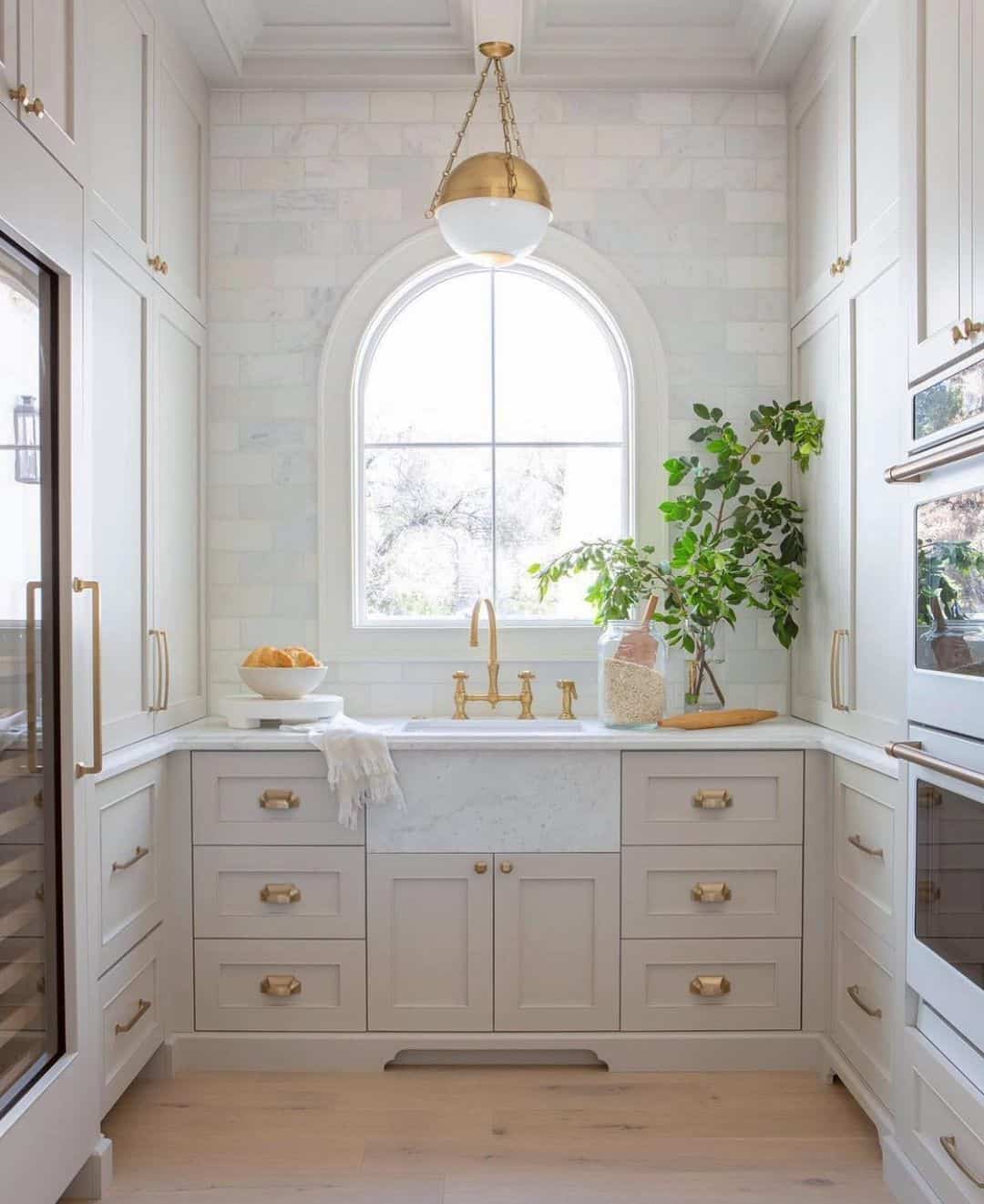 Arched Kitchen Window With Brass Accents - Soul & Lane