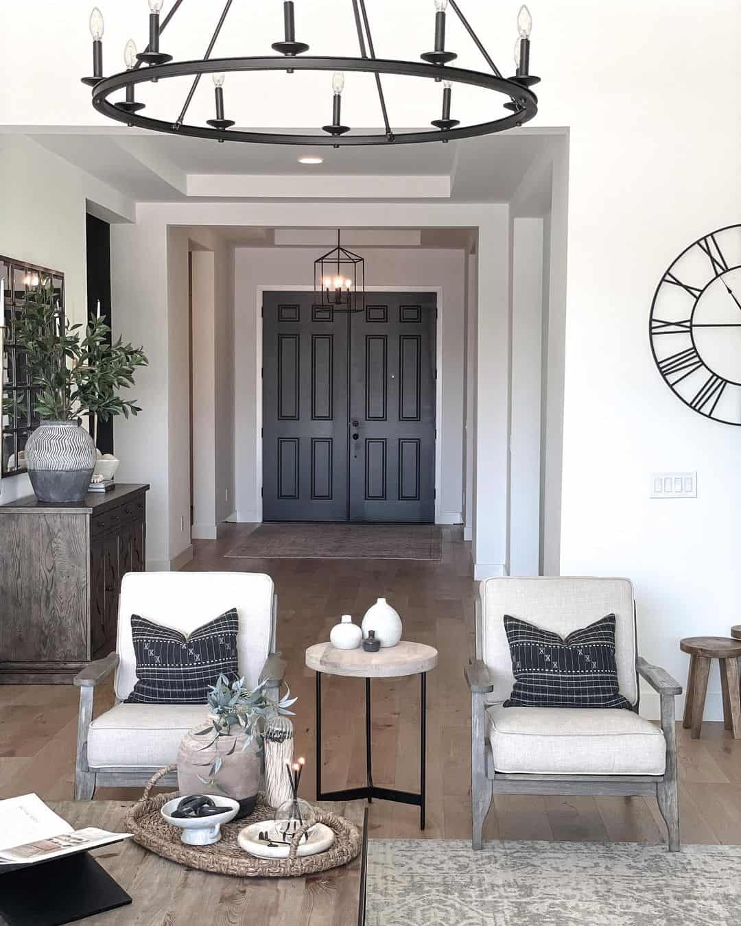 Brown Rug in Front of Black 6-Panel Front Doors - Soul & Lane