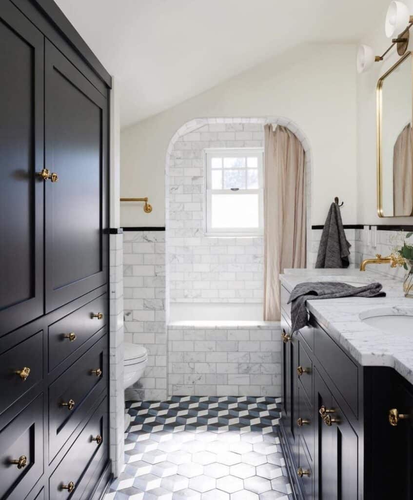 Gray Subway Tile Around Arched Bathtub Entrance - Soul & Lane