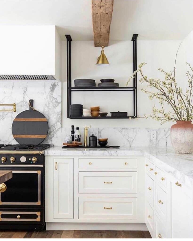 Light Grey Stone Backsplash with Black Stove - Soul & Lane