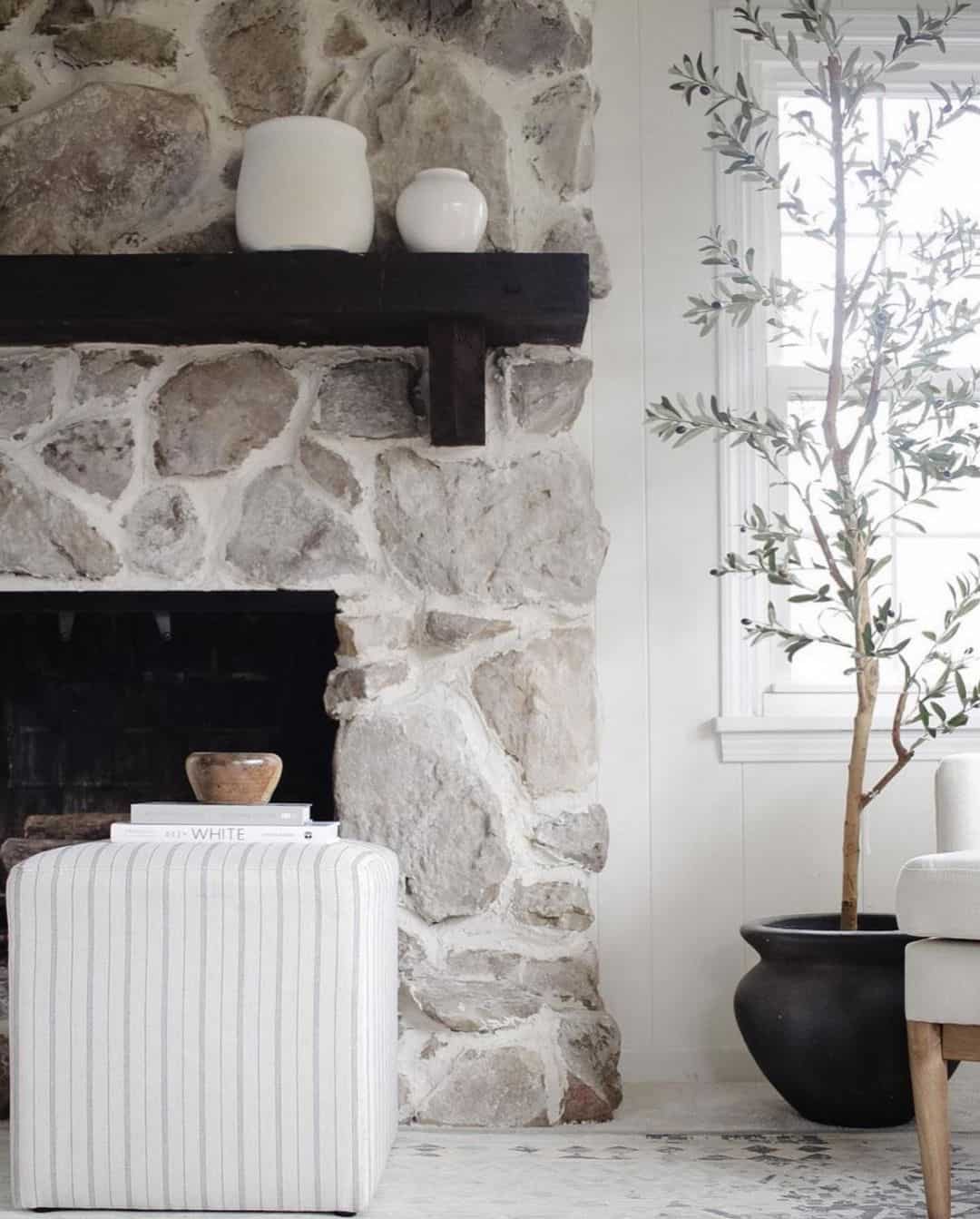Neutral Living Room with Stonework Fireplace - Soul & Lane