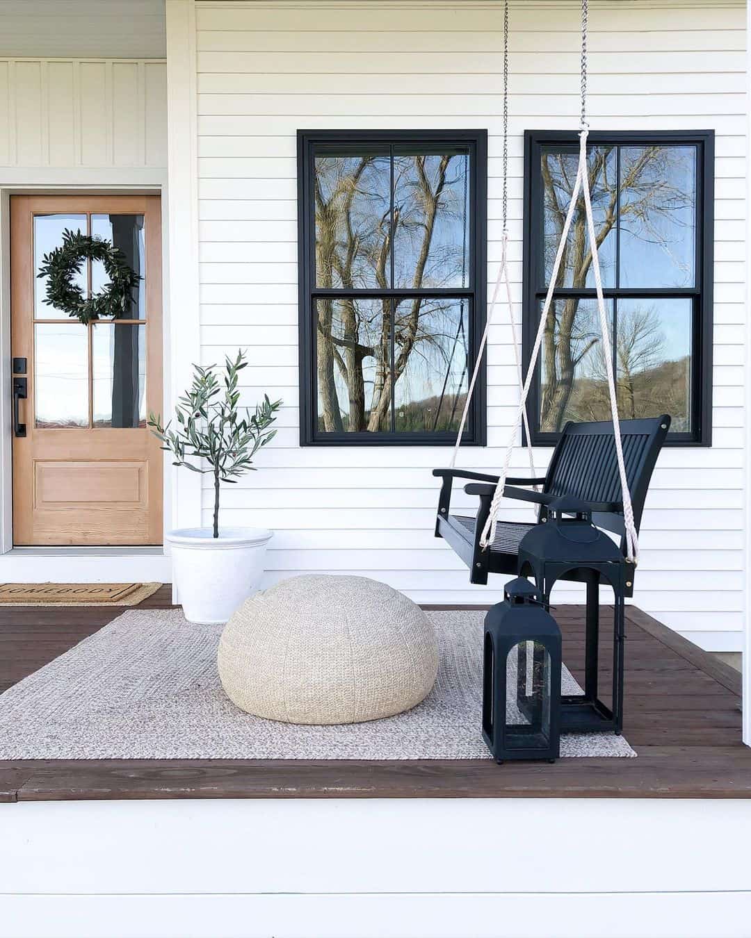 Porch Sitting Area with Swing and Lanterns - Soul & Lane