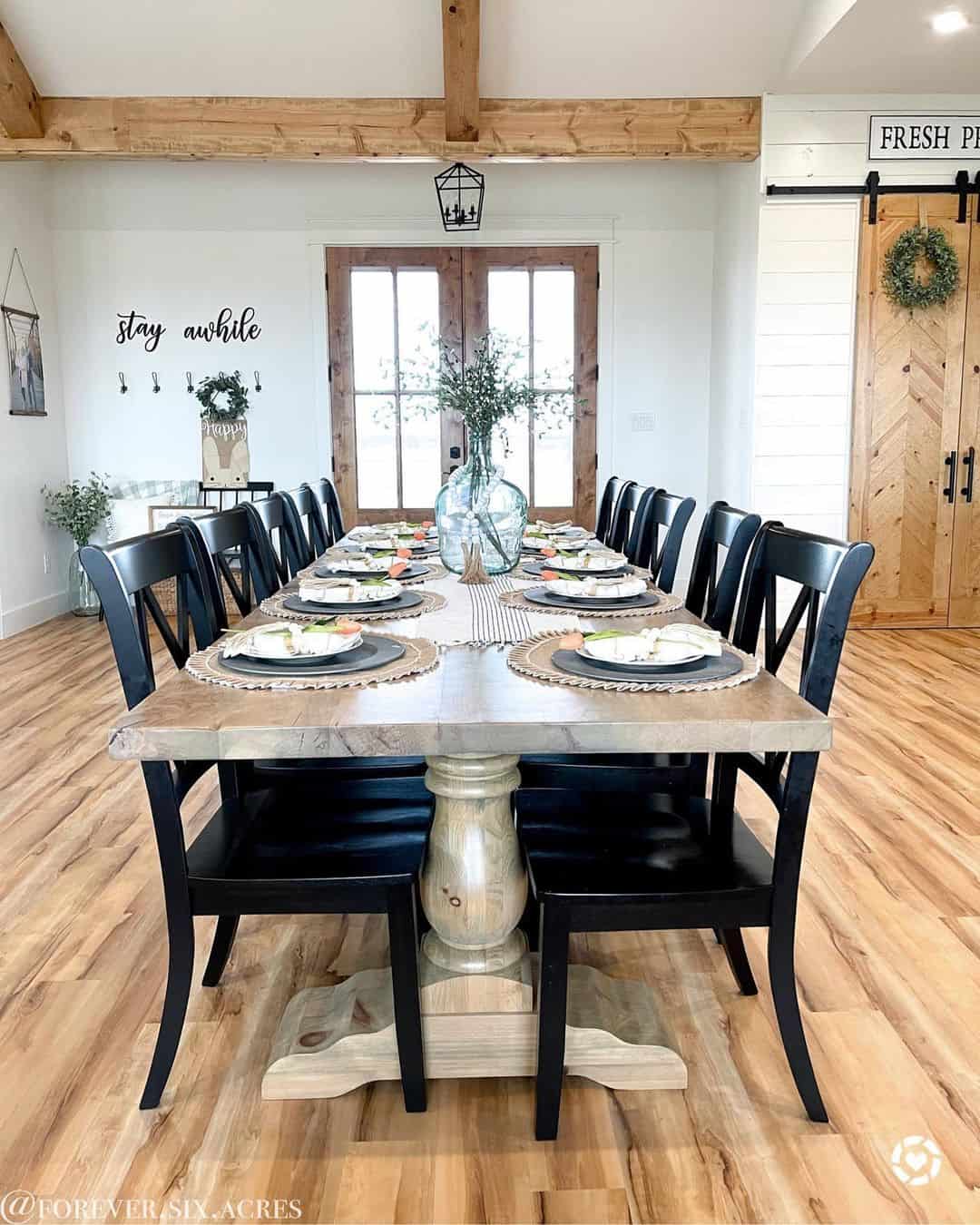 Ten Black Wood Dining Chairs and a Long Wood Table - Soul & Lane