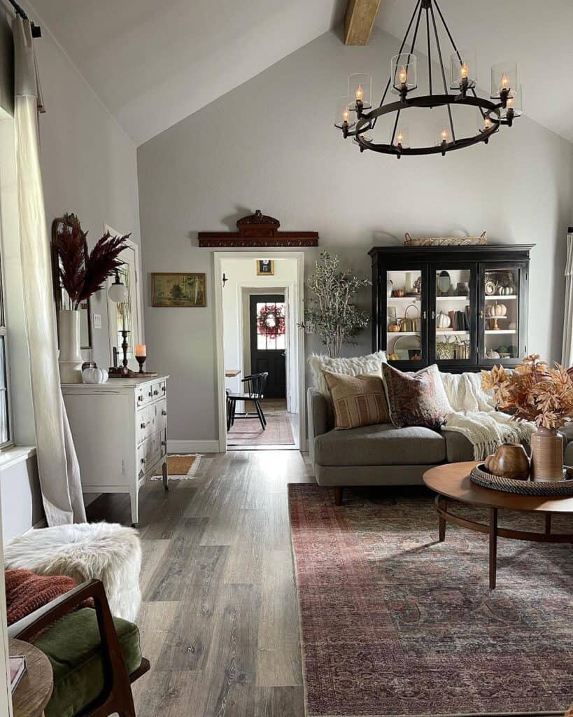 Vaulted Ceiling With Wood Beam and Round Black Chandelier - Soul & Lane