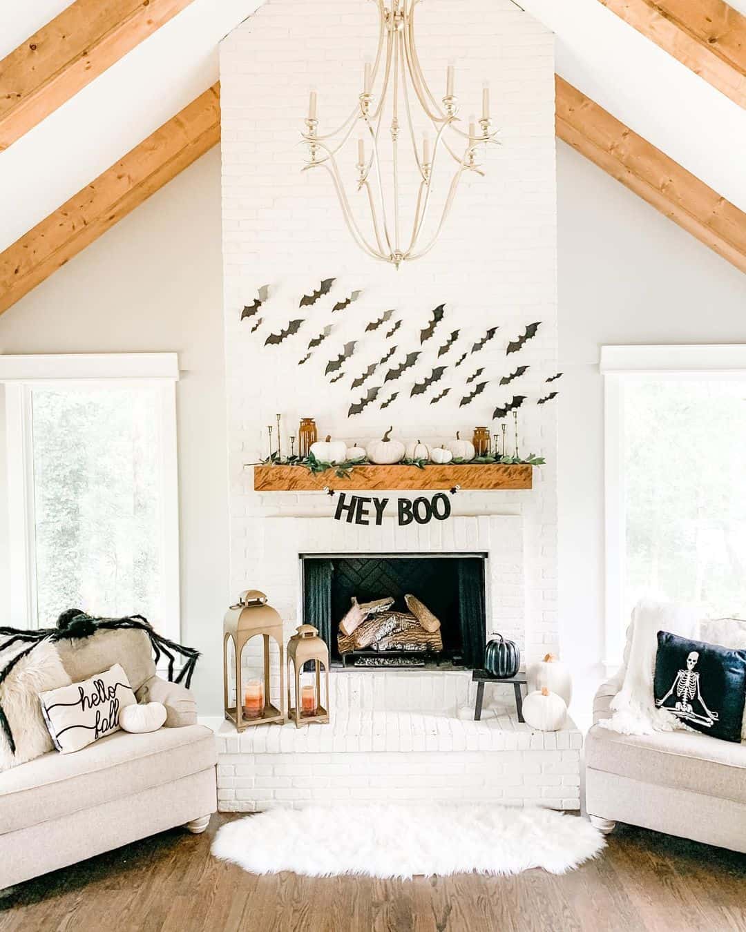 White Platformed Fireplace with Seasonal Display - Soul & Lane