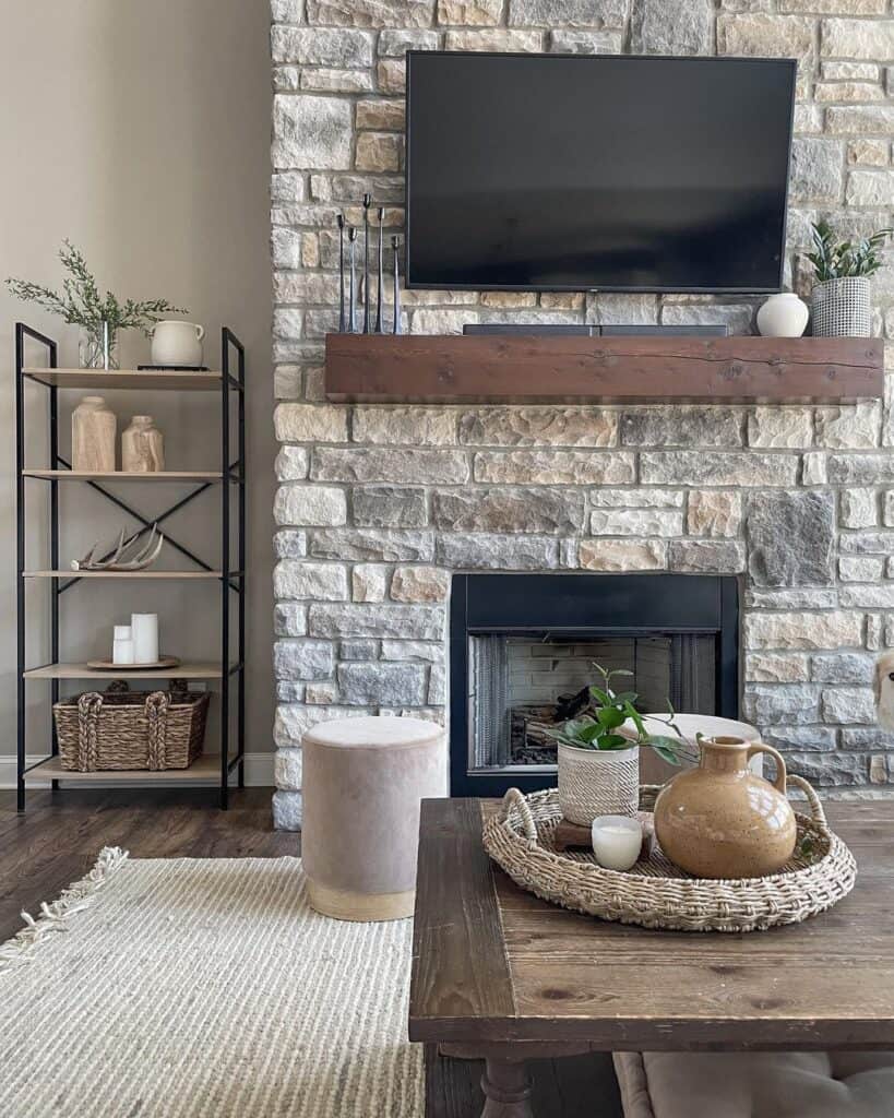 Large Stone Fireplace with Velvet Poufs - Soul & Lane