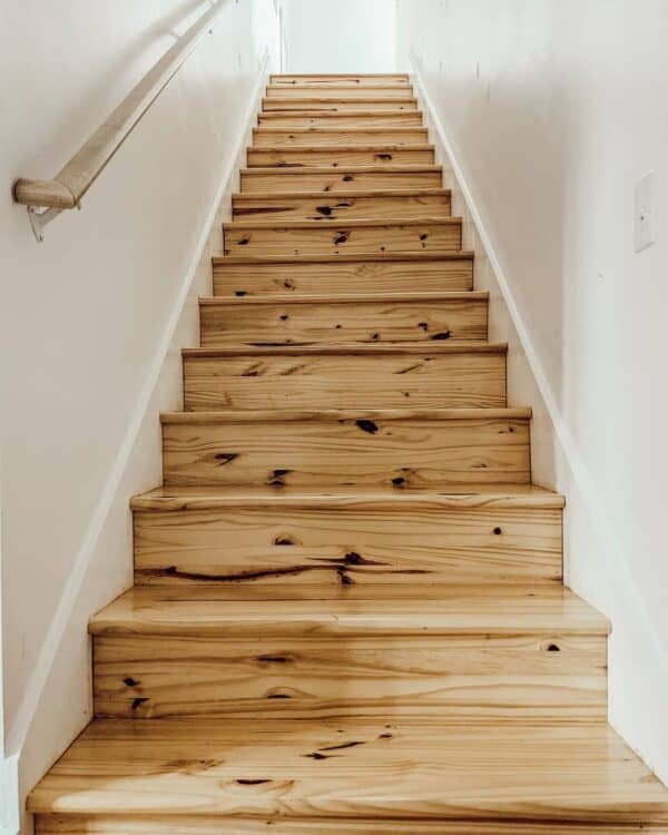 Light Wood Staircase with White Stair Skirt Boards - Soul & Lane