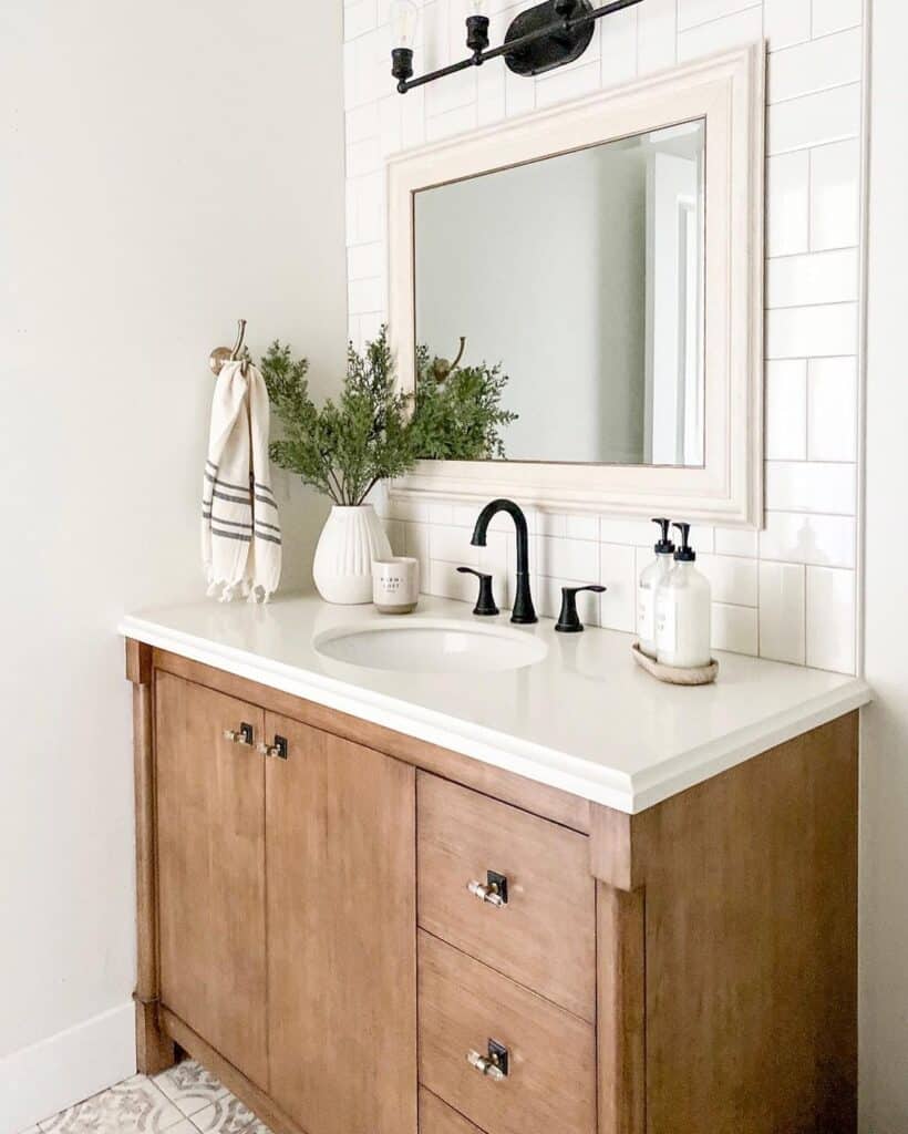 Basket-Weave Tile Wall in Well-Lit Bathroom - Soul & Lane