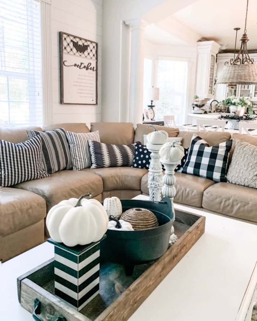 Pumpkins Balanced on Coffee Table Pillars - Soul & Lane