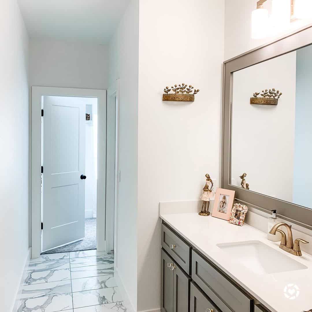 Rectangular Mirror Above Pink Bathroom Accessories - Soul & Lane