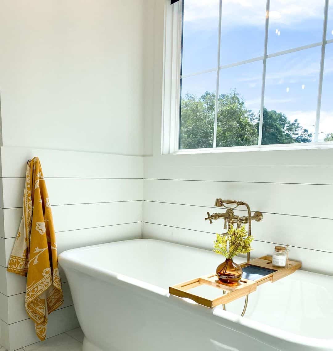 Refined Gold, Orange, and Amber Tones in Well-Lit Bathroom - Soul & Lane