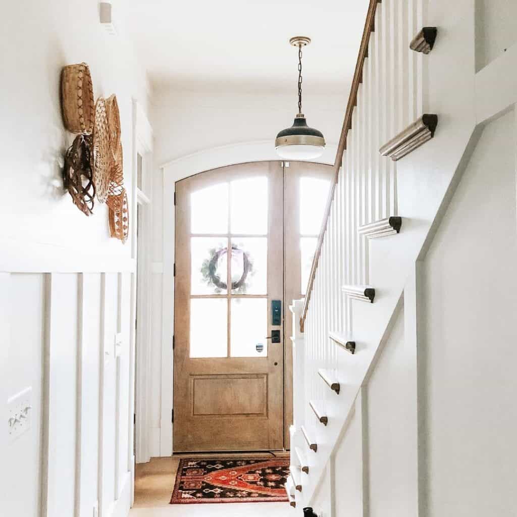 White and Wood Entryway with Staircase - Soul & Lane