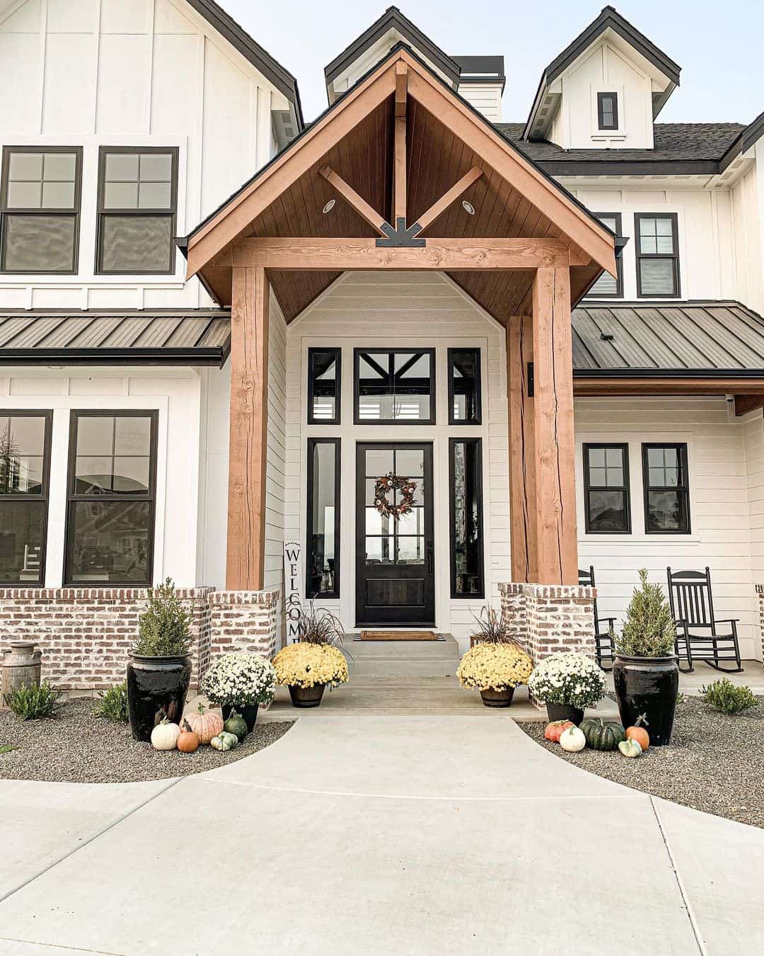 Wood Portico Over Black Framed Windows - Soul & Lane