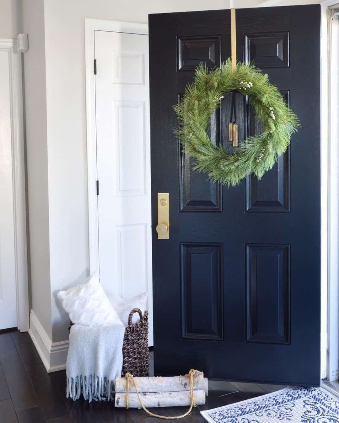 Black Front Door With Winter Decorations - Soul & Lane