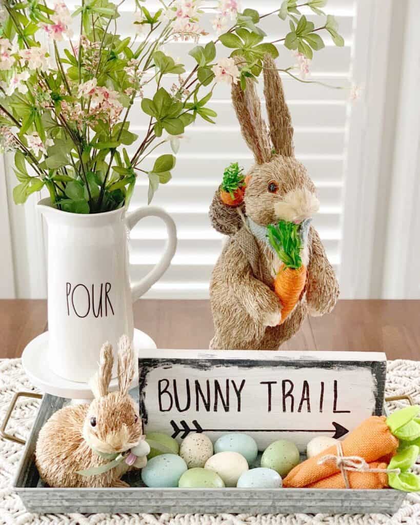 Brown Rabbit Next to Green Spring Foliage - Soul & Lane