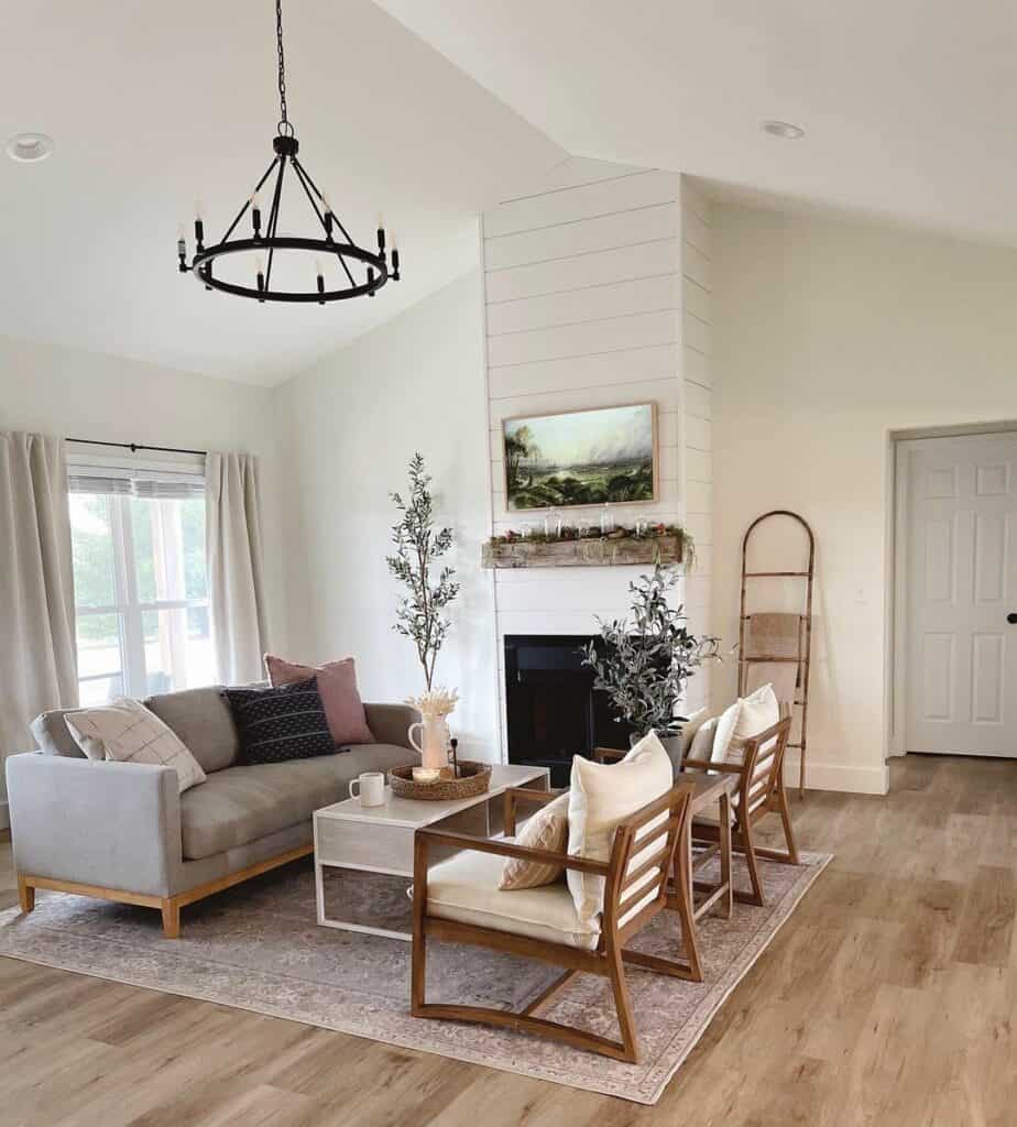 Gray Sofa and Wagon Wheel Chandelier Living Room - Soul & Lane