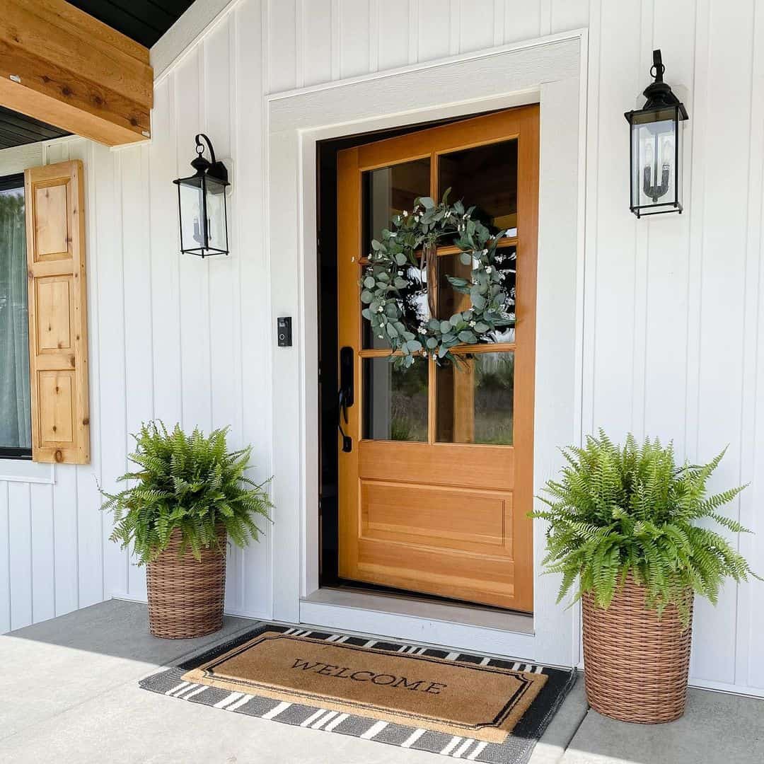 Light Wood Door with White Trim and Plant Décor - Soul & Lane