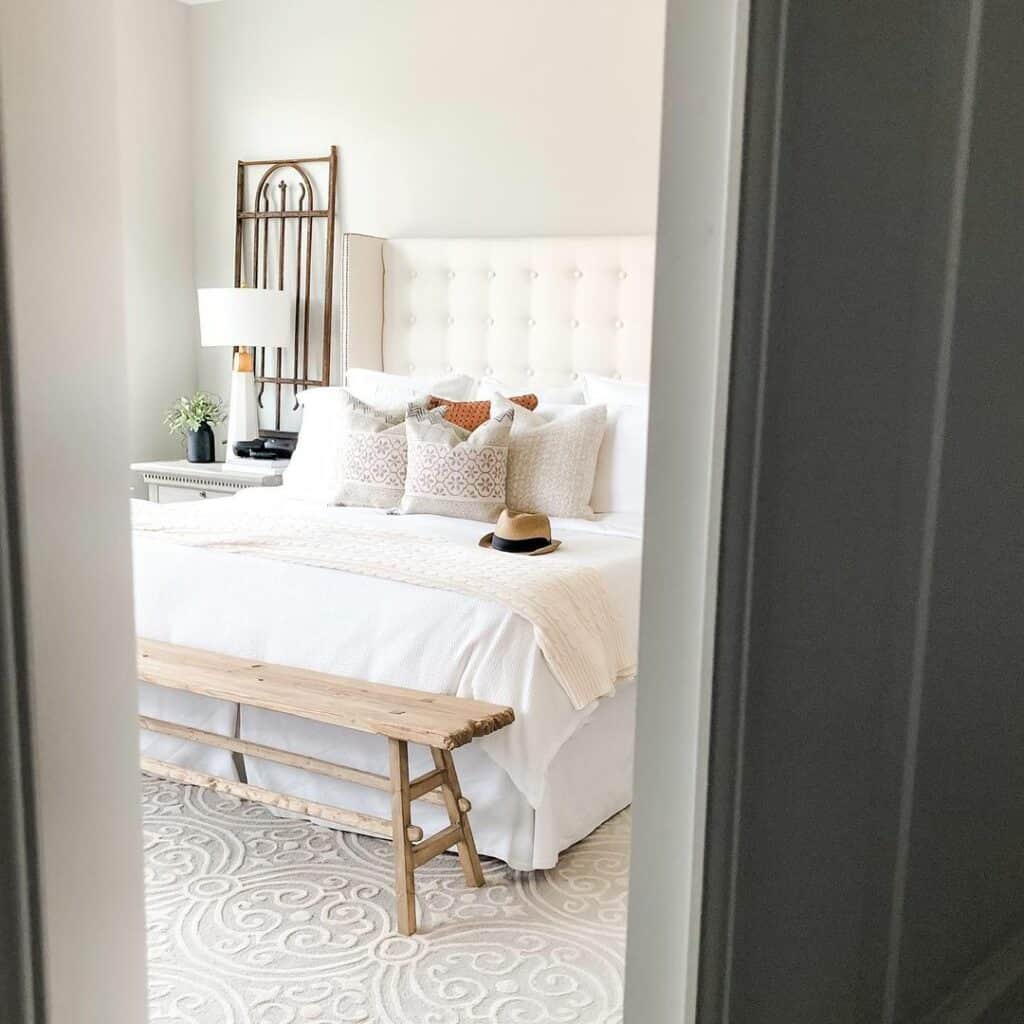 Rustic Wood Bedroom Bench on an Ornate White Rug - Soul & Lane