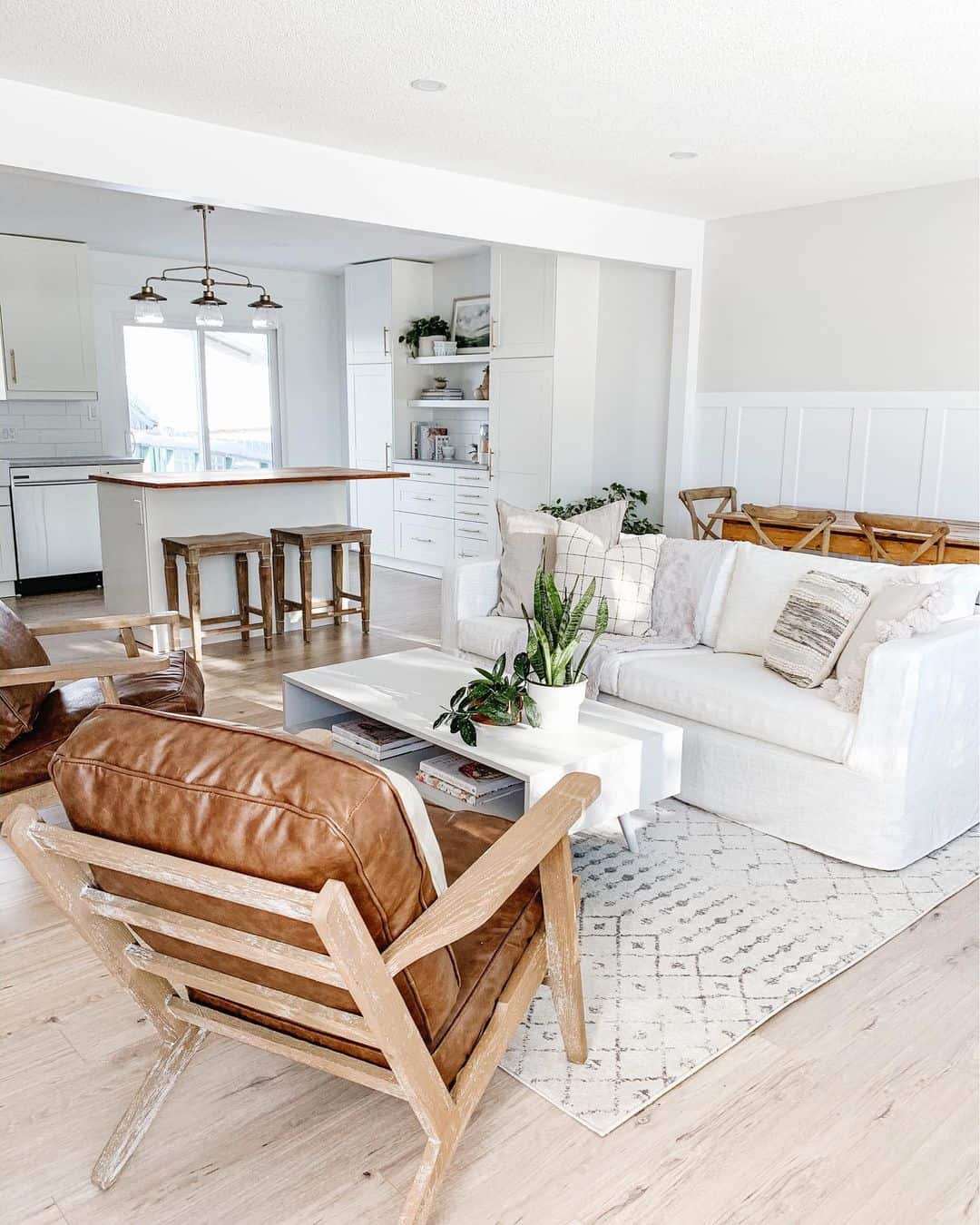 Boho-style Living Room With Leather Chairs - Soul & Lane