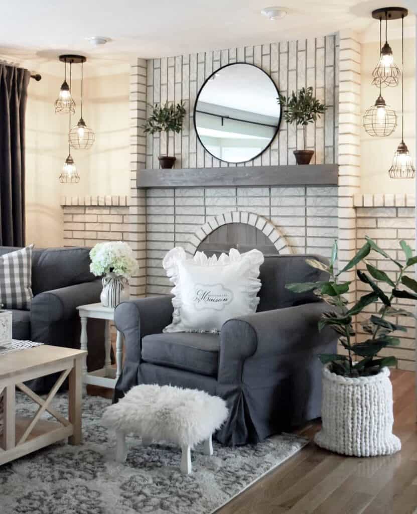 Dark Gray Mantel and Built-In Brick Fireplace - Soul & Lane