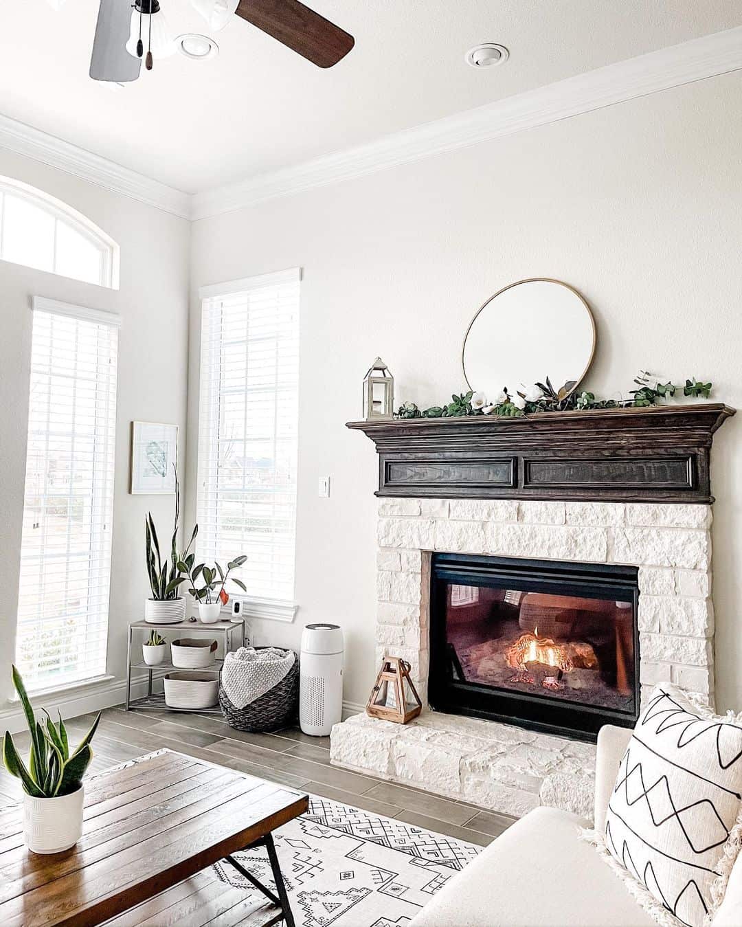 Distressed Dark Brown Mantel with Stone Fireplace - Soul & Lane