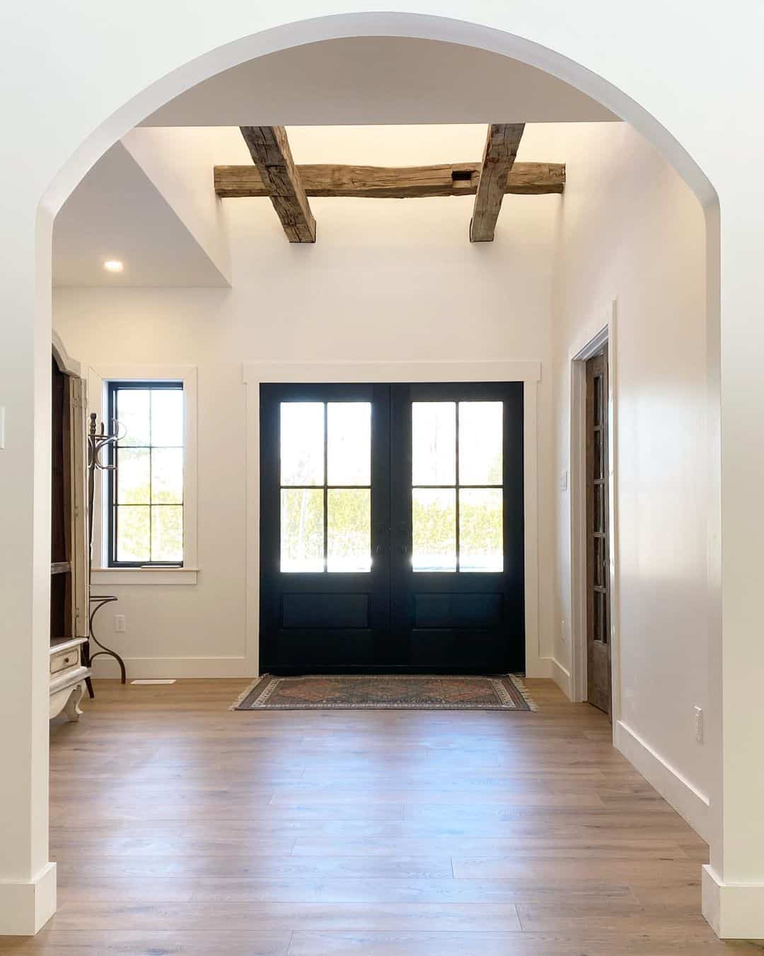 Rustic Wood Ceiling Beams on White Entryway Walls - Soul & Lane