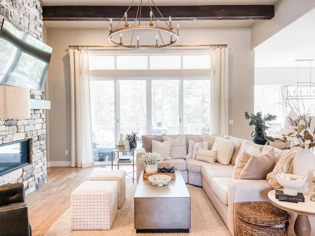 Gold Wagon Wheel Chandelier and Long White Curtains - Soul & Lane