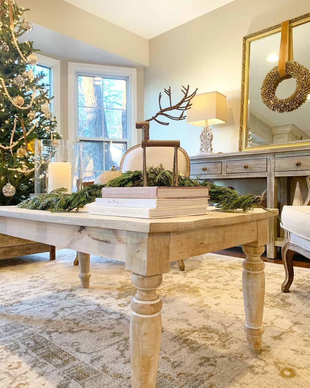 Light Wood Coffee Table With Wooden Deer Décor - Soul & Lane