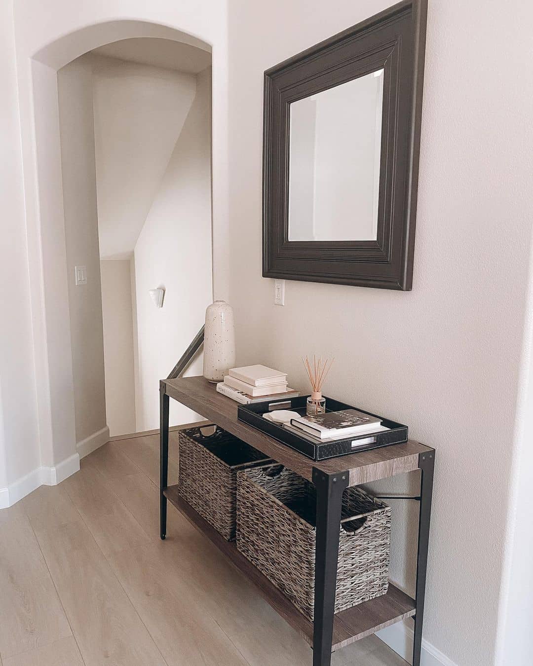 Archway Leads Into Cream-colored Entryway - Soul & Lane