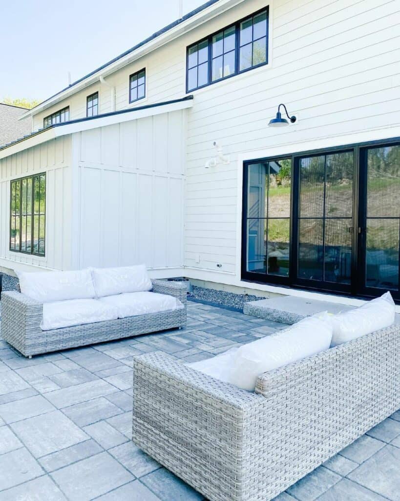 Black Wall Light Illuminates Back Patio - Soul & Lane