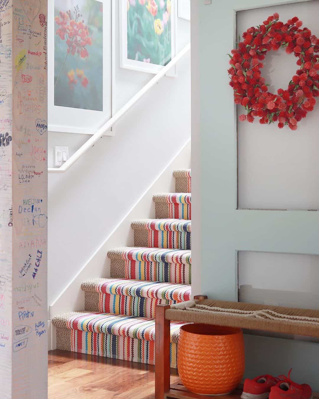 Bright Multi-colored Runner on Beige Carpeted Stairs - Soul & Lane