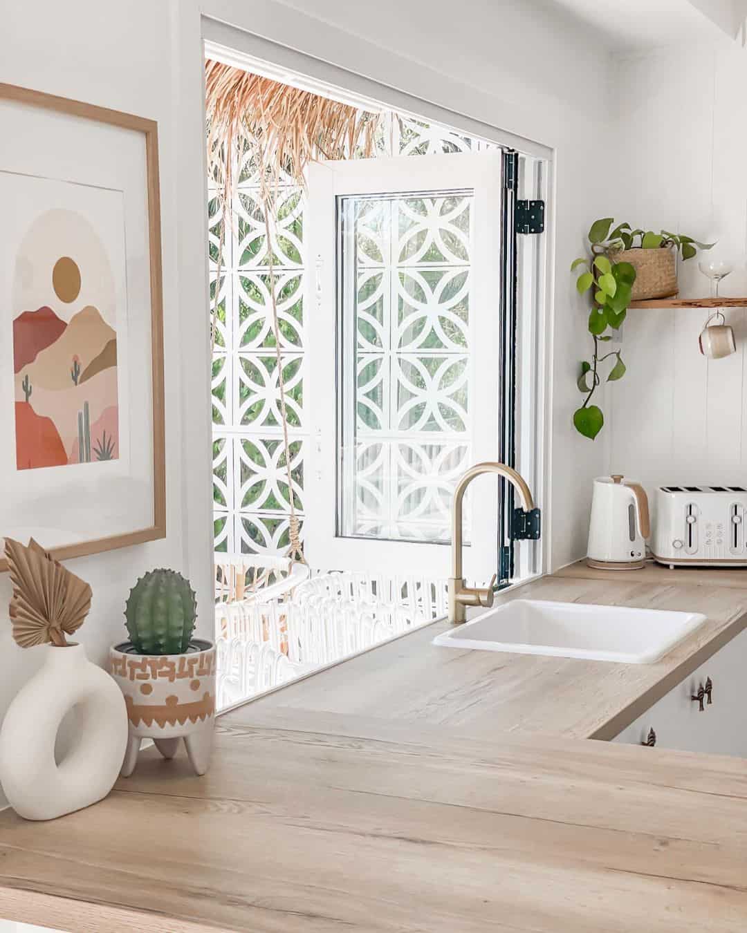 Charming Farmhouse Kitchen With Light Wood Countertop - Soul & Lane