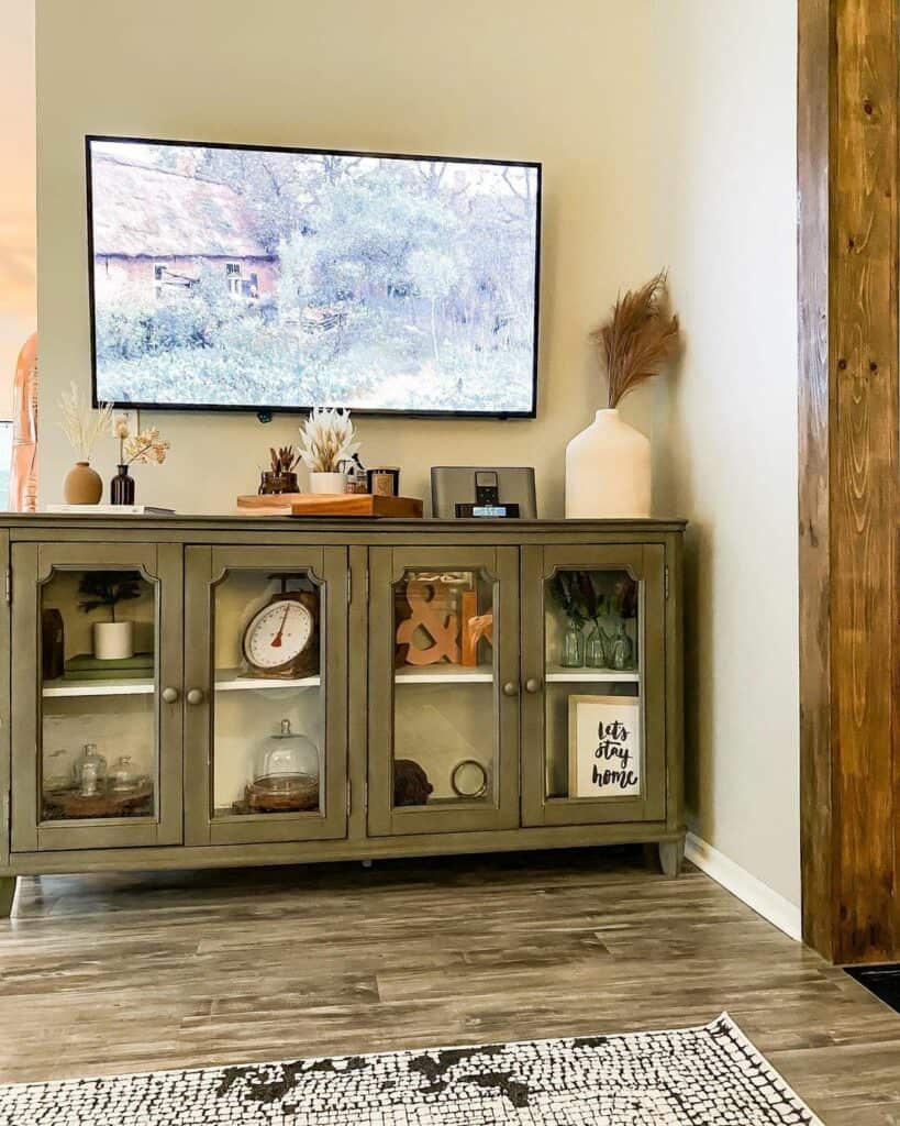 Living Room With Rustic Green Cabinetries - Soul & Lane