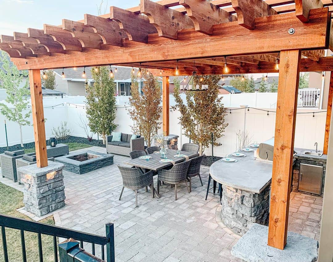 Outdoor Kitchen With Stone Fire Pit - Soul & Lane
