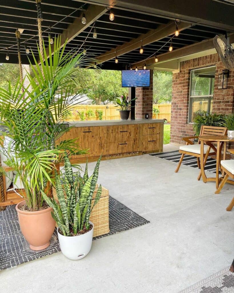 Pergola With String Lights Above Outdoor Bar - Soul & Lane