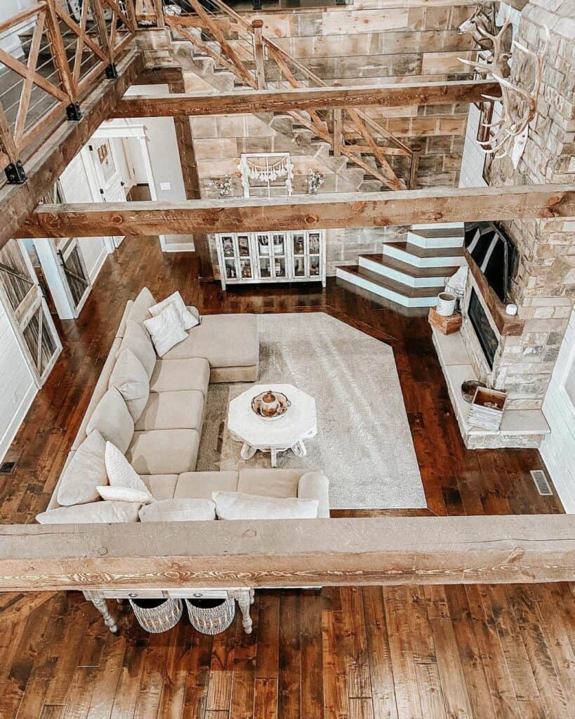 Rustic Wood Staircase Overlooking Family Room - Soul & Lane