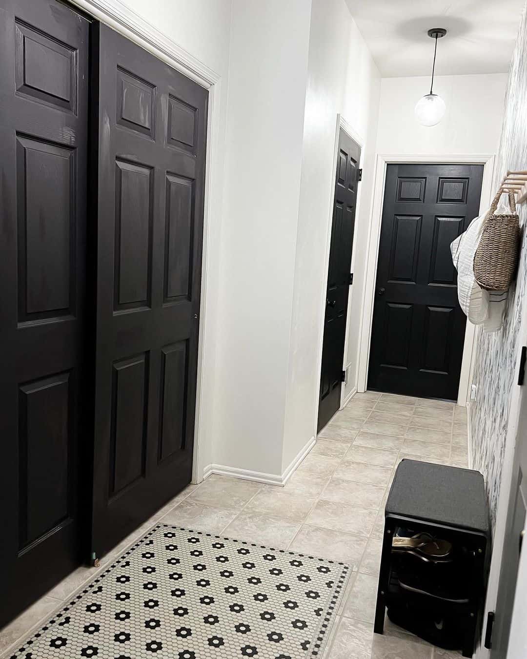 White Hallway With Black Doors and Trim - Soul & Lane