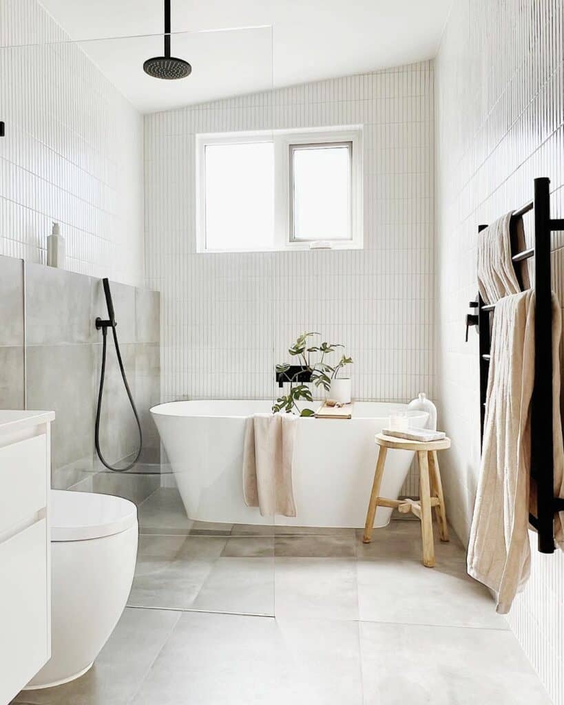Freestanding Tub With Shower in Simple Bathroom - Soul & Lane