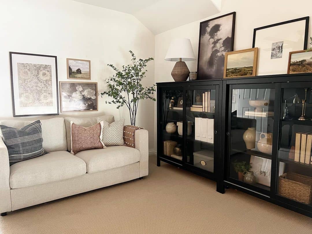 Long Black Display Cabinet With Layered Artwork - Soul & Lane