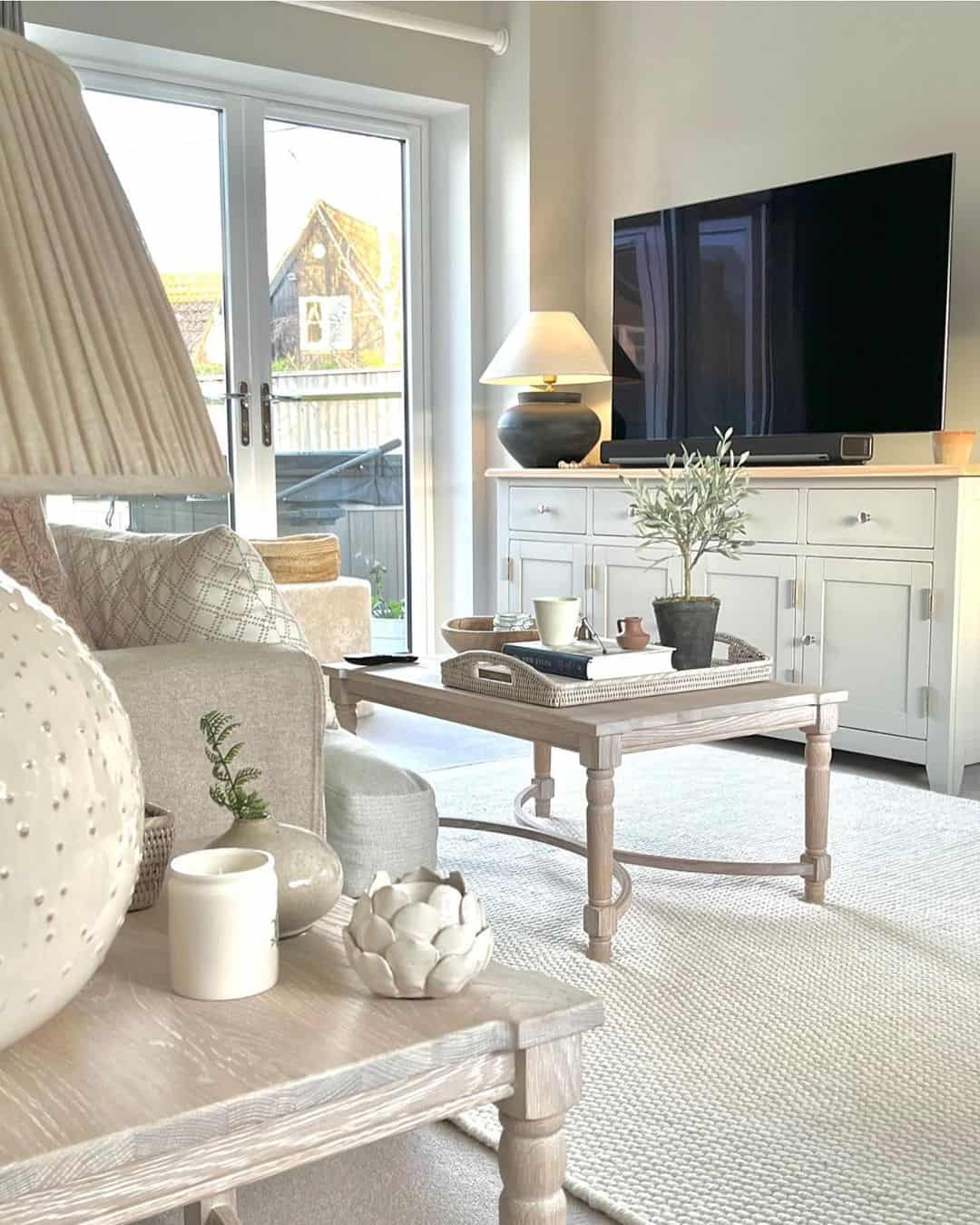 Neutral Living Room With Entertainment Center - Soul & Lane