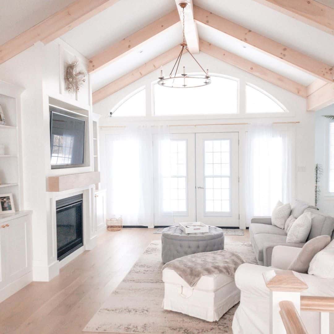 Exposed Natural Wood Ceiling Beams in an A-frame Living Room - Soul & Lane