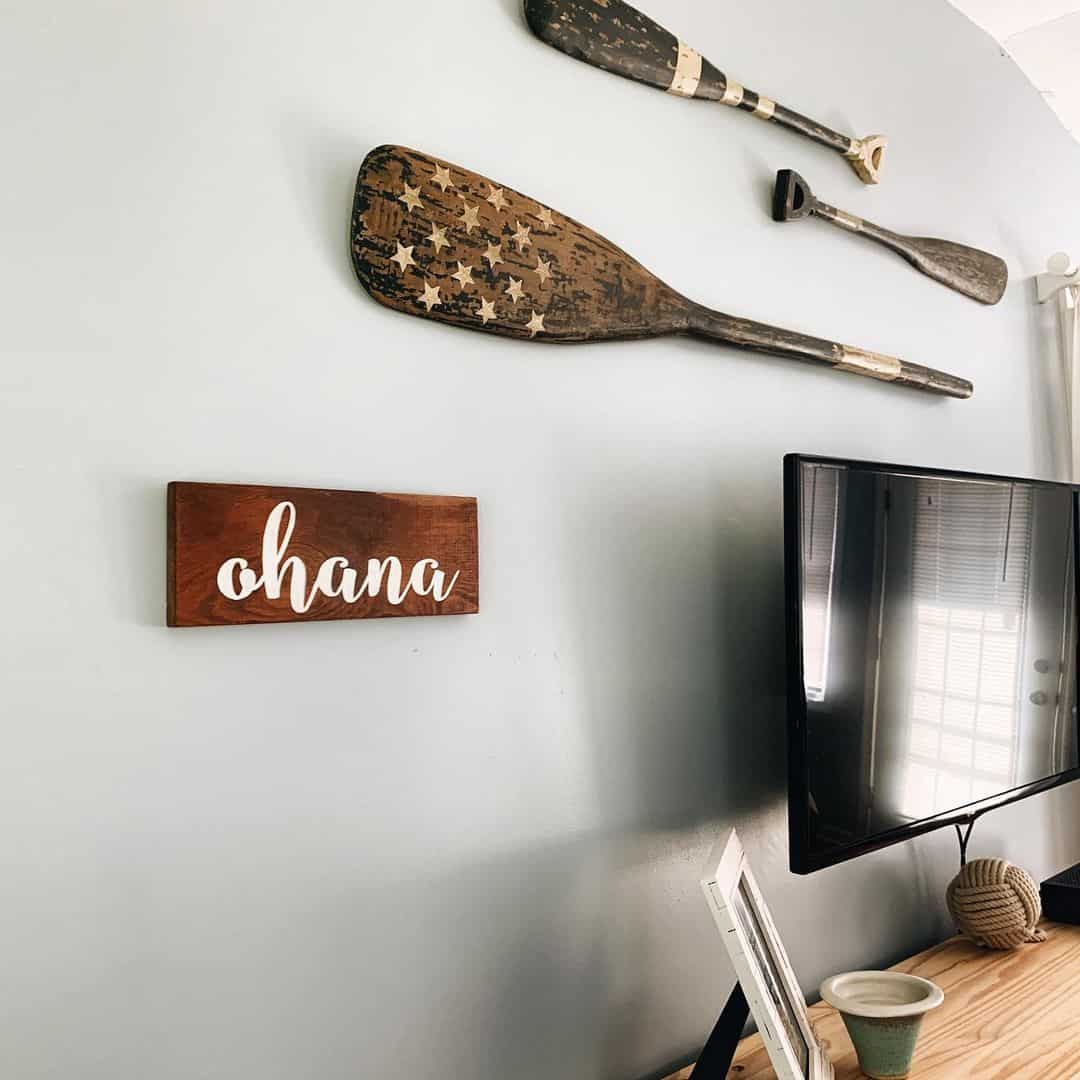 Gray TV Wall With Decorative Wooden Oars - Soul & Lane