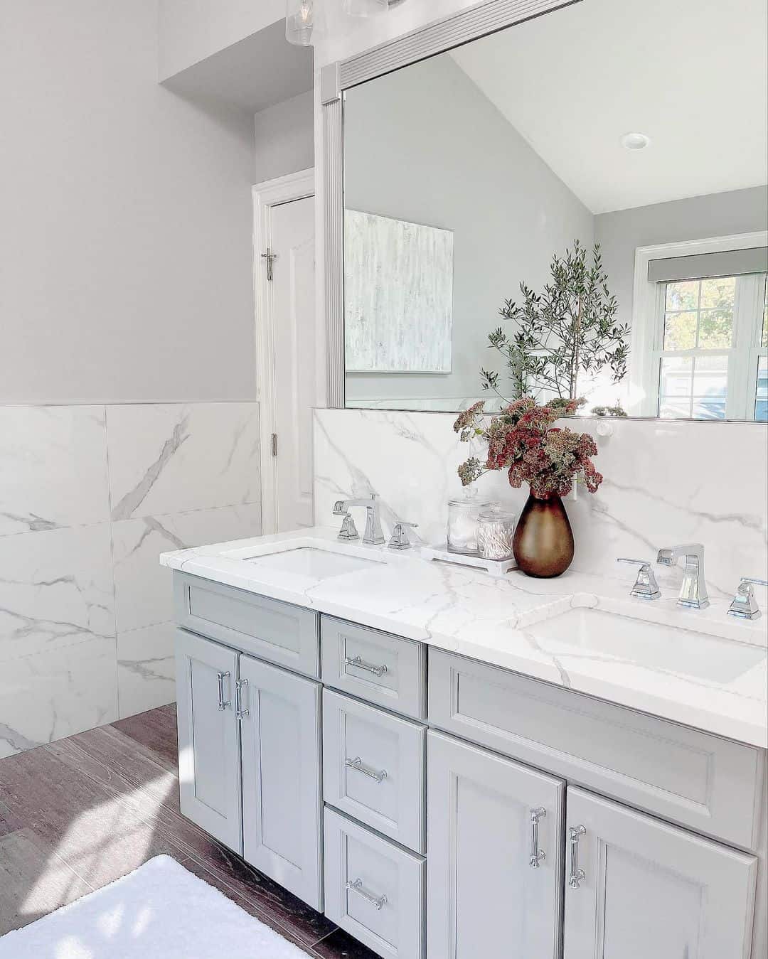 Light Gray Vanity Contrasts White Marbled Walls - Soul & Lane