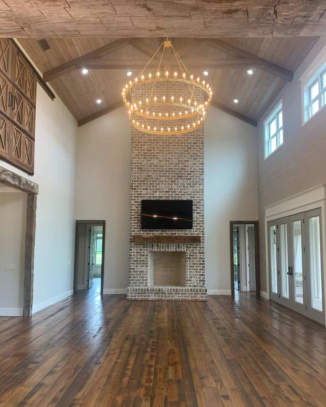 Lodge Ceilings With Recessed Lights and a Gold Chandelier - Soul & Lane