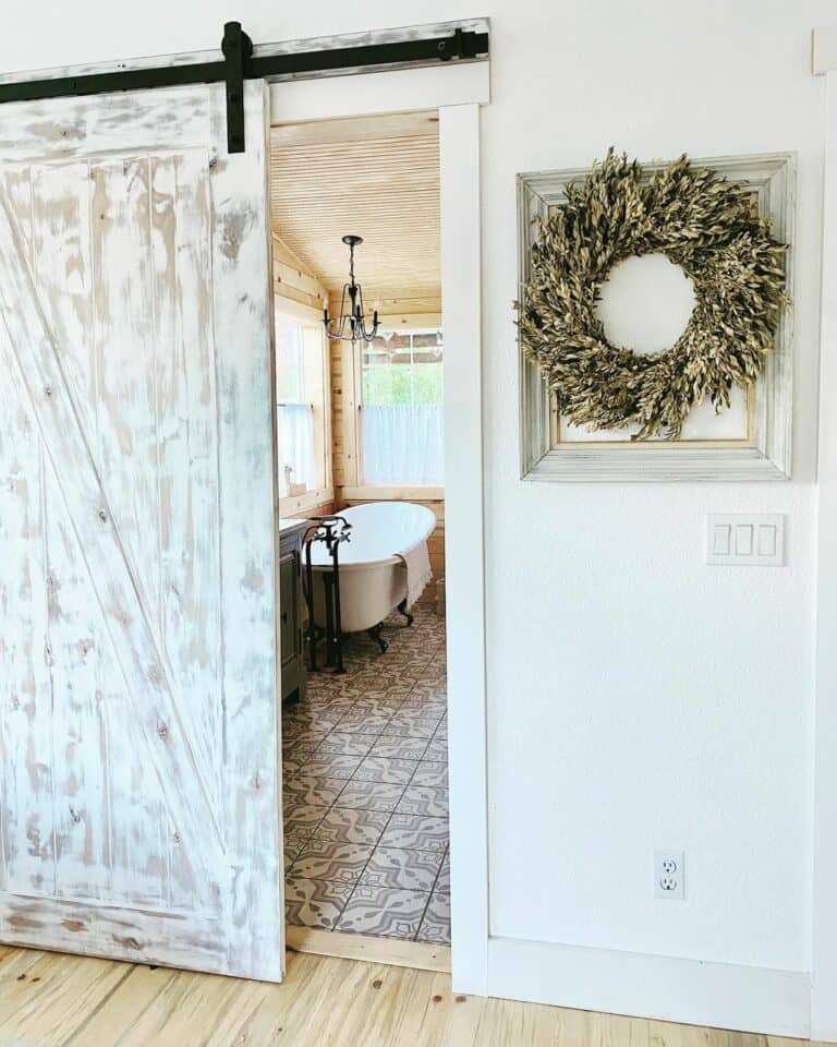 Barn Door Opened To Reveal Farmhouse Bathroom - Soul & Lane