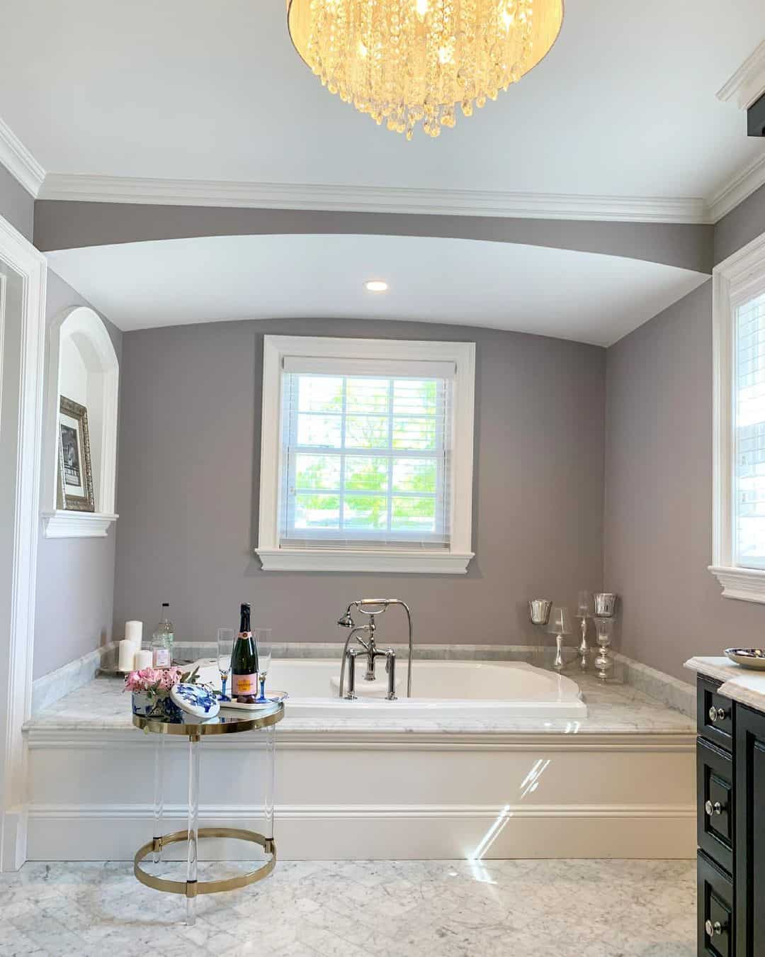 White Drop-in Tub With Gray Marble Trim - Soul & Lane