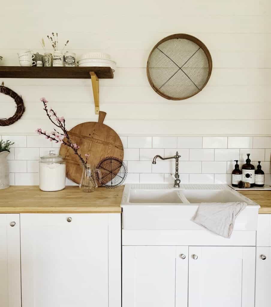White Farmhouse Kitchen With Wooden Countertop - Soul & Lane