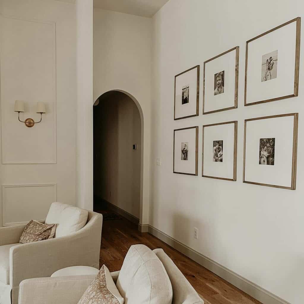 Archway Leads Into a Minimalist Living Room - Soul & Lane
